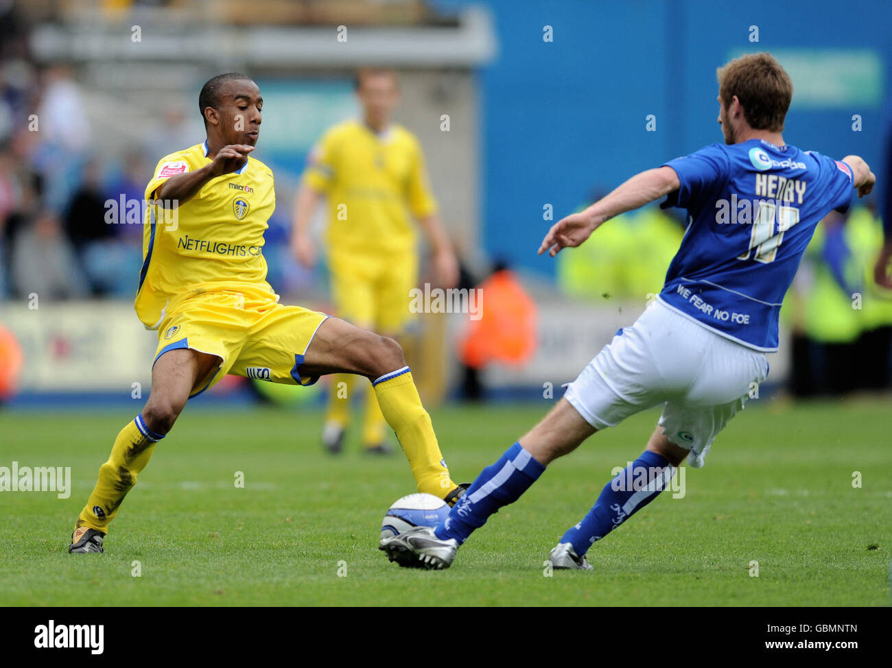 Millwall's James Henry and Leeds' Fabian Delph battle for the ball ...