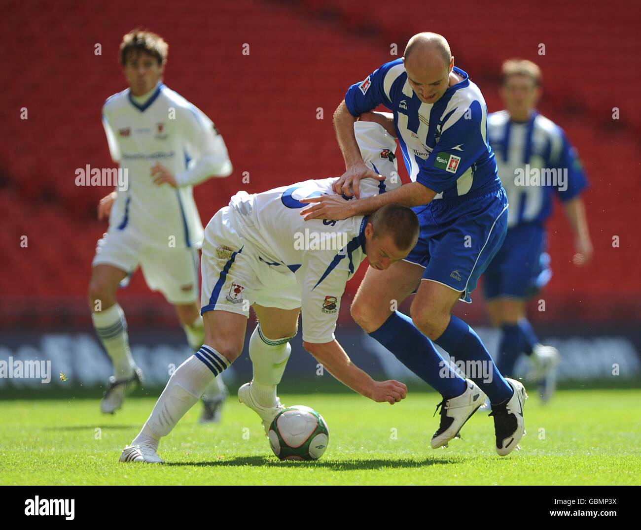 Glossop North End's Danny Yates (left) and Whitley Bay's Paul Chow ...