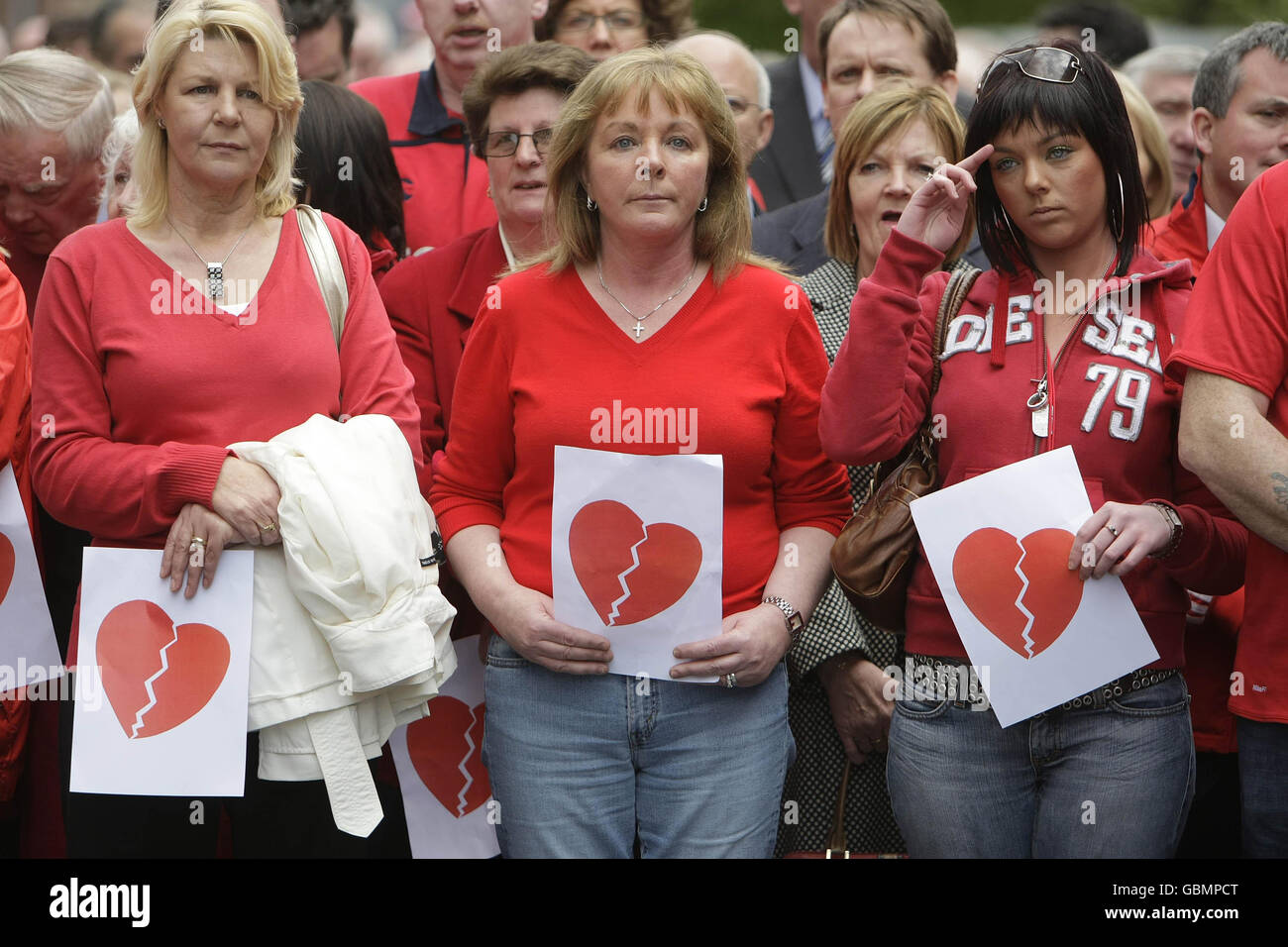 Carmel Collins, mother (centre) and Leanne Collins, sister (right) of ...