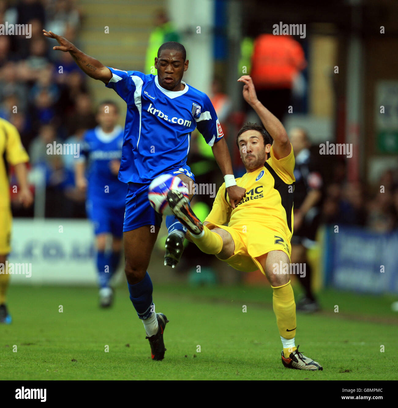 Gillinghams dennis oli rochdales rory mcardle battle for the ball hi ...