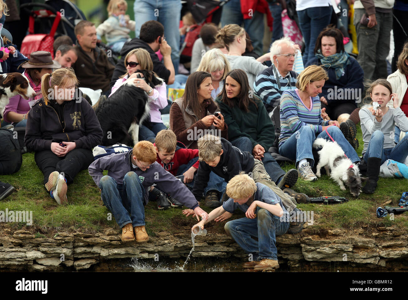 Spectators watch the action during the cross country competition at the ...