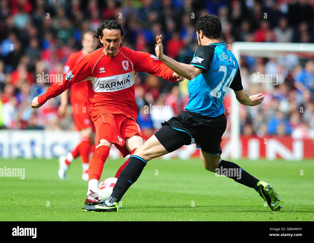 Middlesbrough's Tuncay Sanli (left) and Aston Villa's Carlos Cuellar ...
