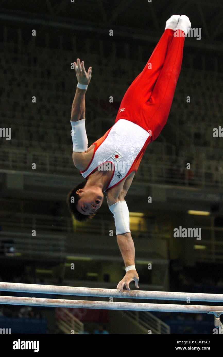 Japan's Takehiro Kashima in action on the parallel bars Stock Photo - Alamy