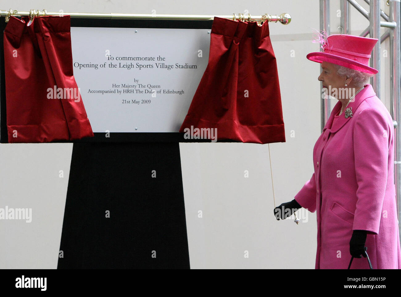 Queen visits Greater Manchester. Queen Elizabeth II on stage at Leigh ...