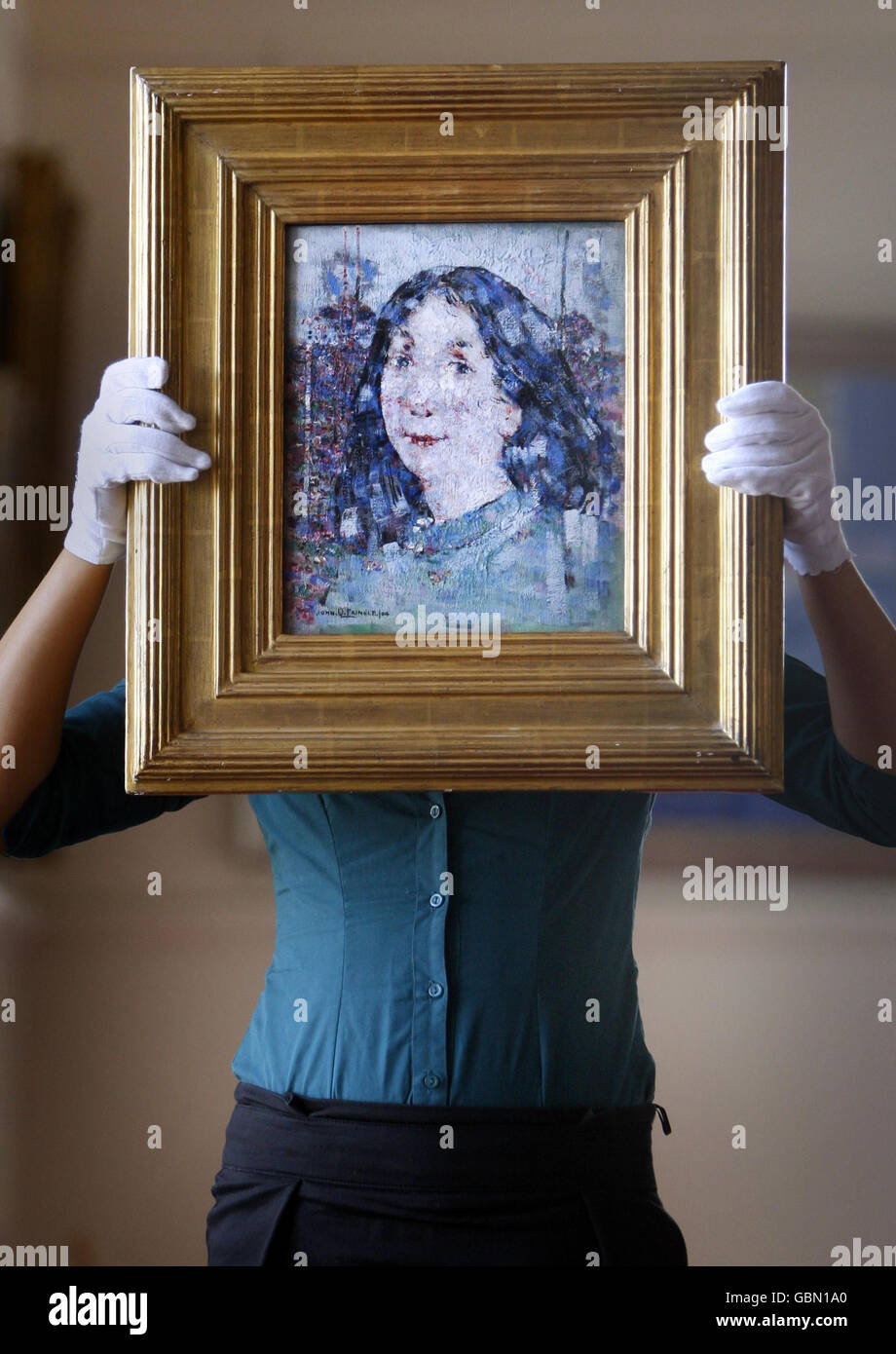 Heidi Squirrell from Lyon & Turnbull holds a rare painting by artist ...