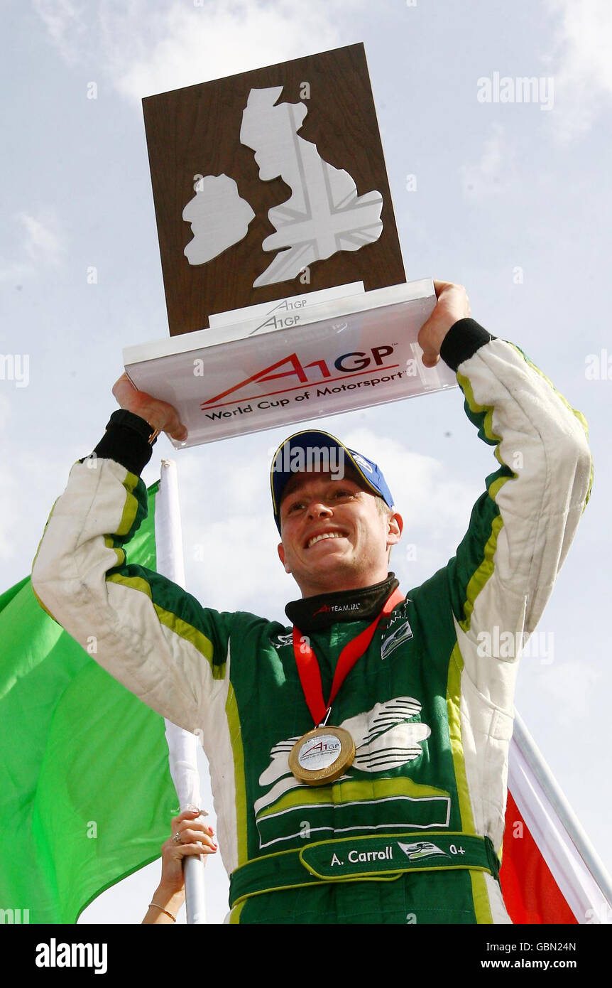 Ireland's Adam Carroll celebrates victory in the feature race and ...