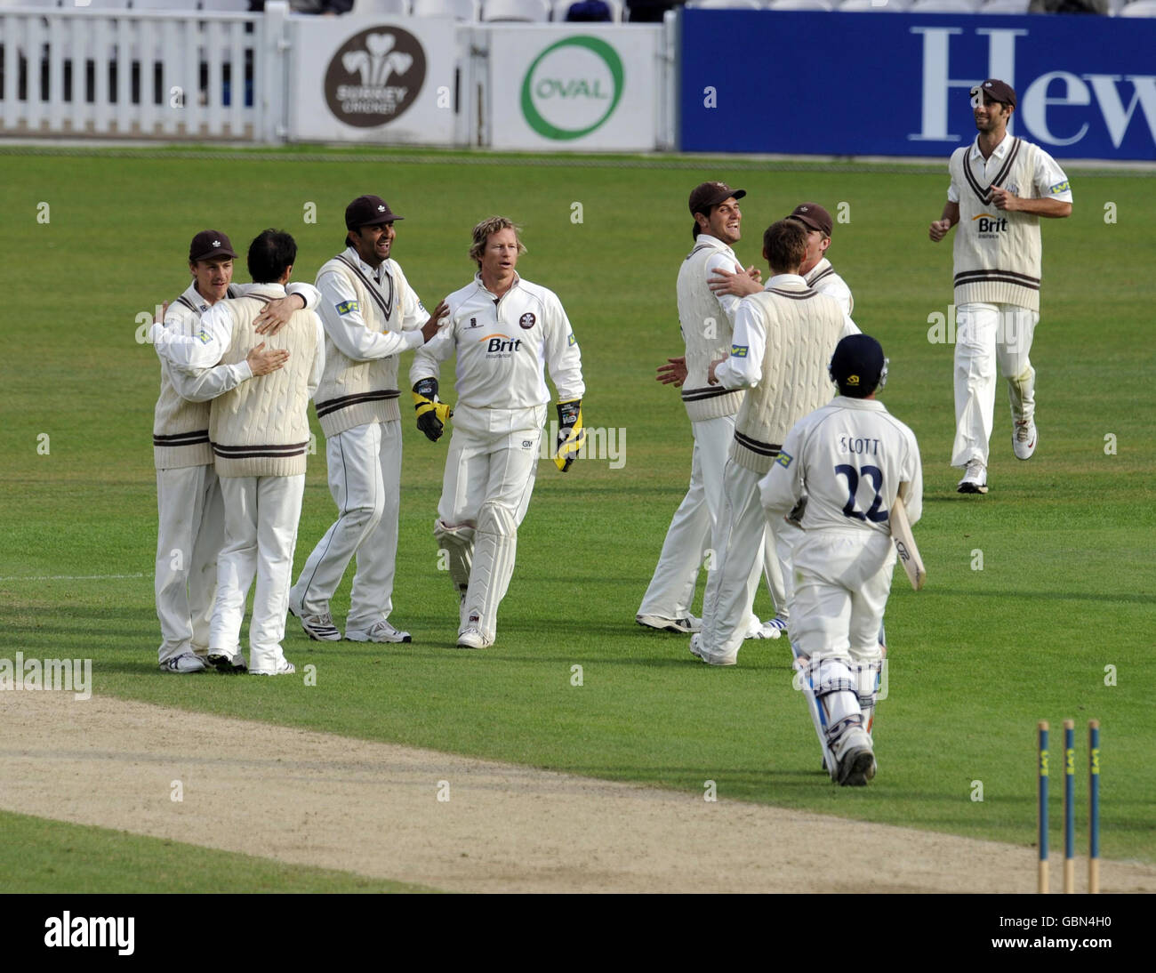 Surrey wicketkeeper Jon Batty celebrates after running out Middlesex's ...