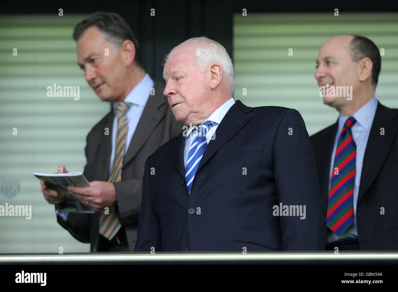 Wigan Athletic's chairman Dave Whelan (centre) and Chief Executive of ...