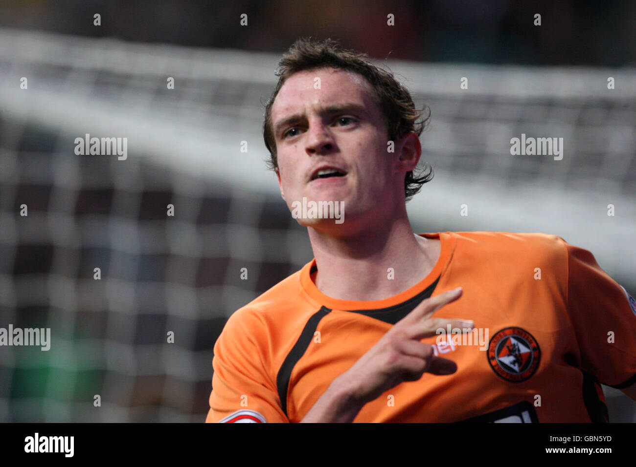Dundee United's David Robertson celebrates scoring during the ...