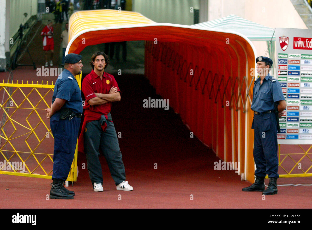 Security guards stand at the entrance to the players' tunnel with ...