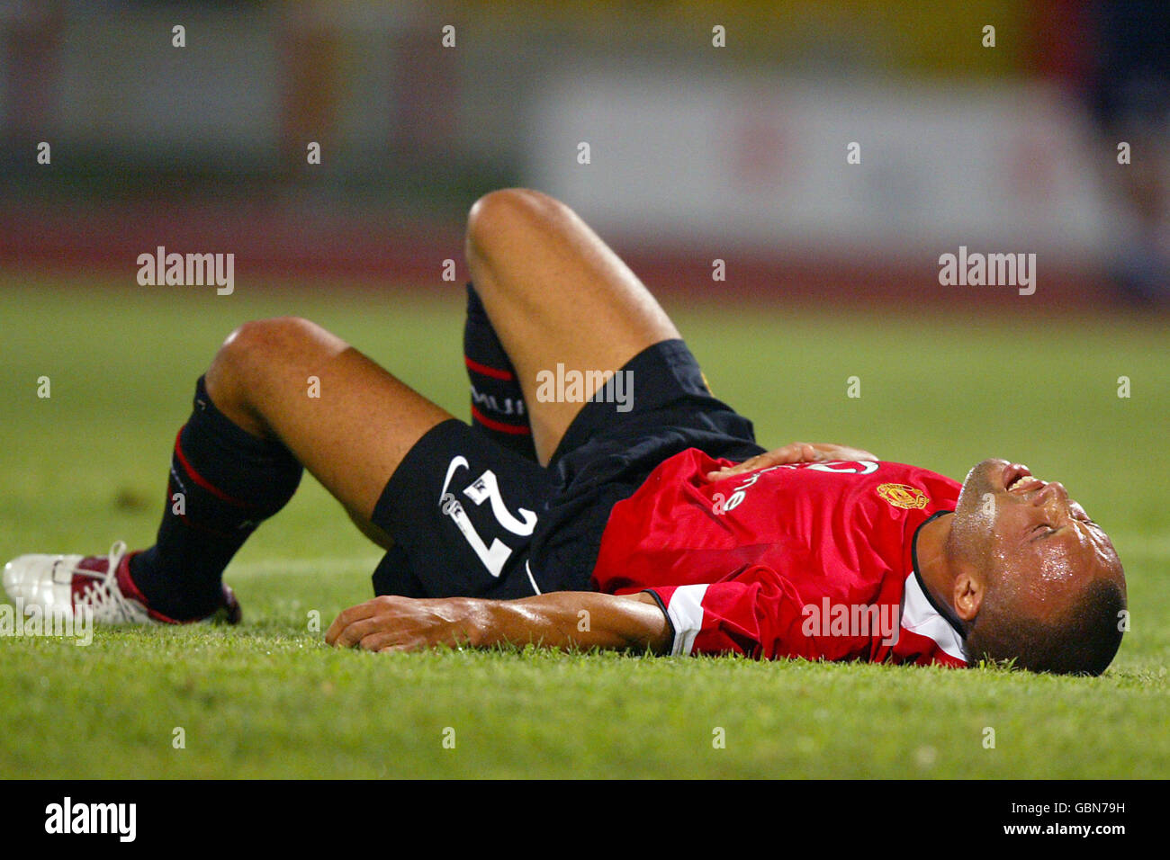 Football utd injury action hi-res stock photography and images - Alamy