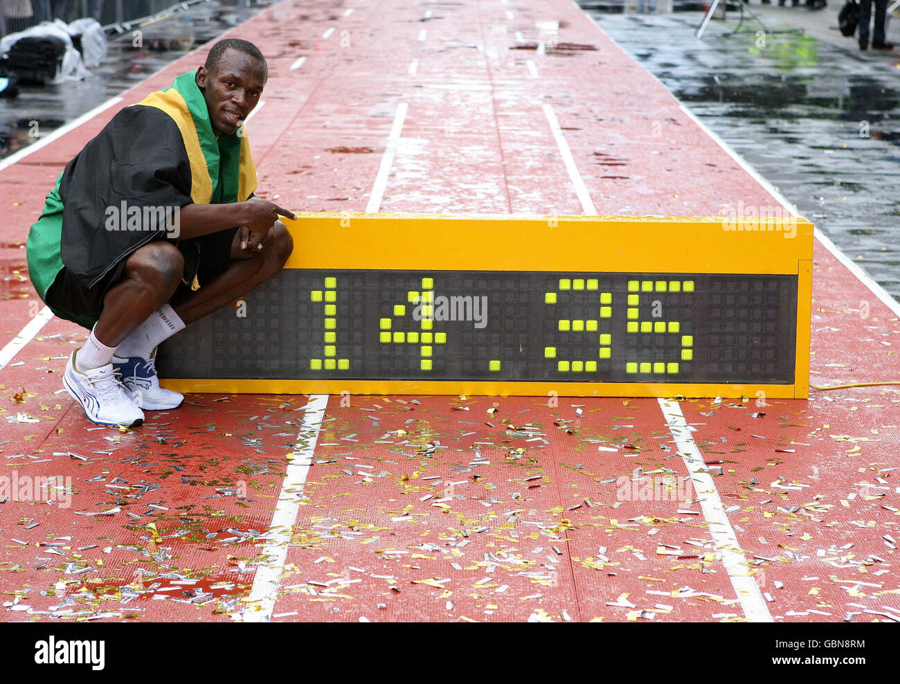 Jamaica's Usain Bolt celebrates winning the 150m Event on a specially ...