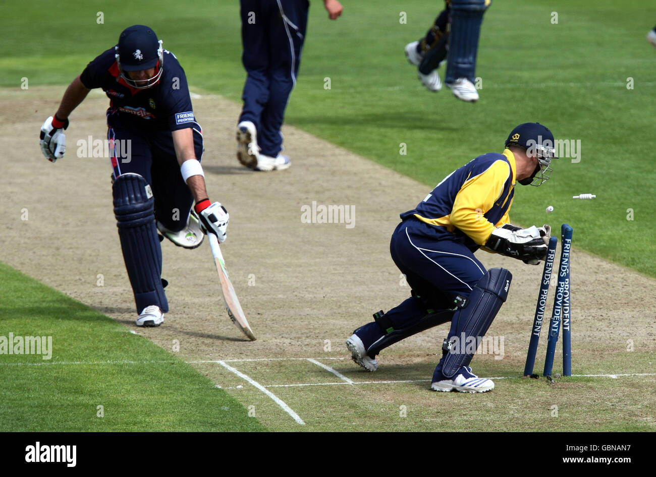 Kent's Justin Kemp is run out by Warwickshire's Tim Ambrose during the ...