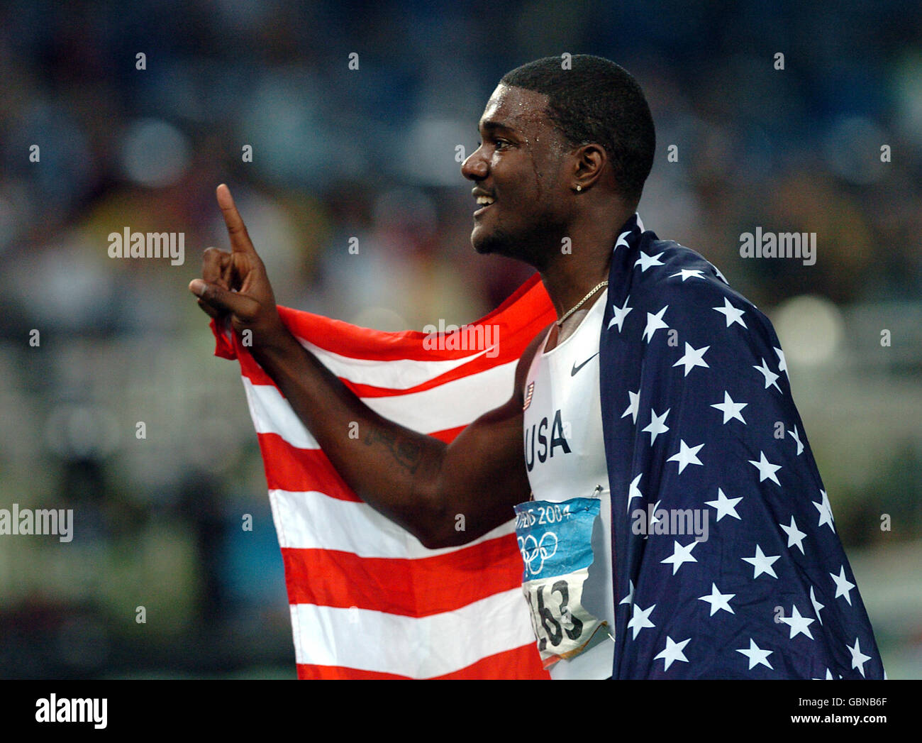 Athletics - Athens Olympic Games 2004 - Men's 100m Final. USA's Justin ...