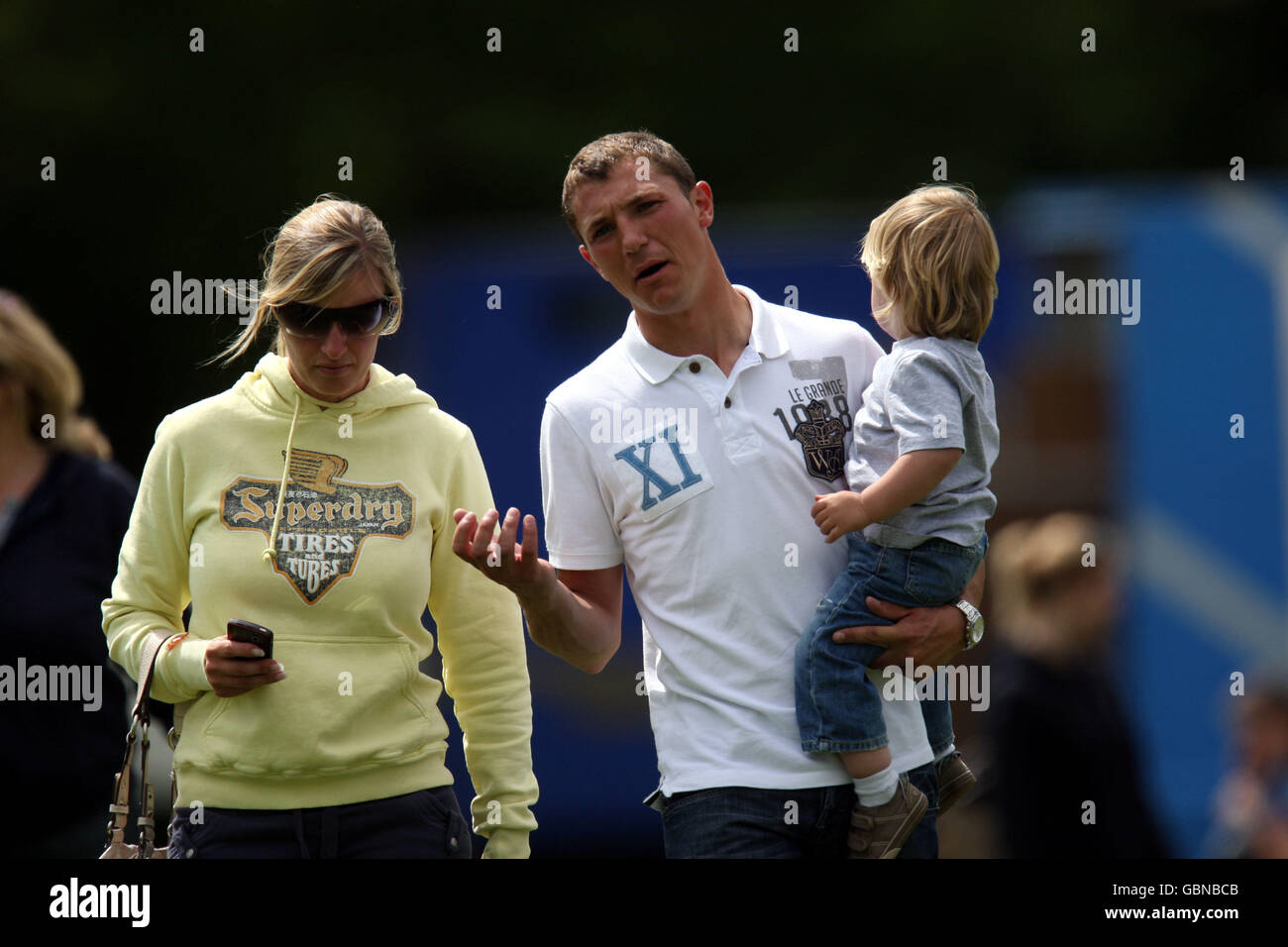Andrew Gould with his son and wife Polly (l) at the Mattingley Horse ...