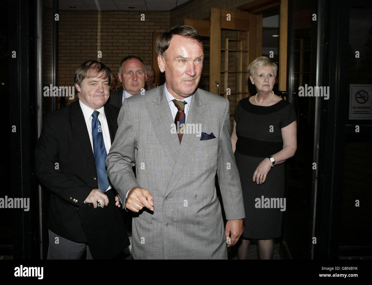 Conservative MP Andrew MacKay (centre) leaves the Kerith Community ...