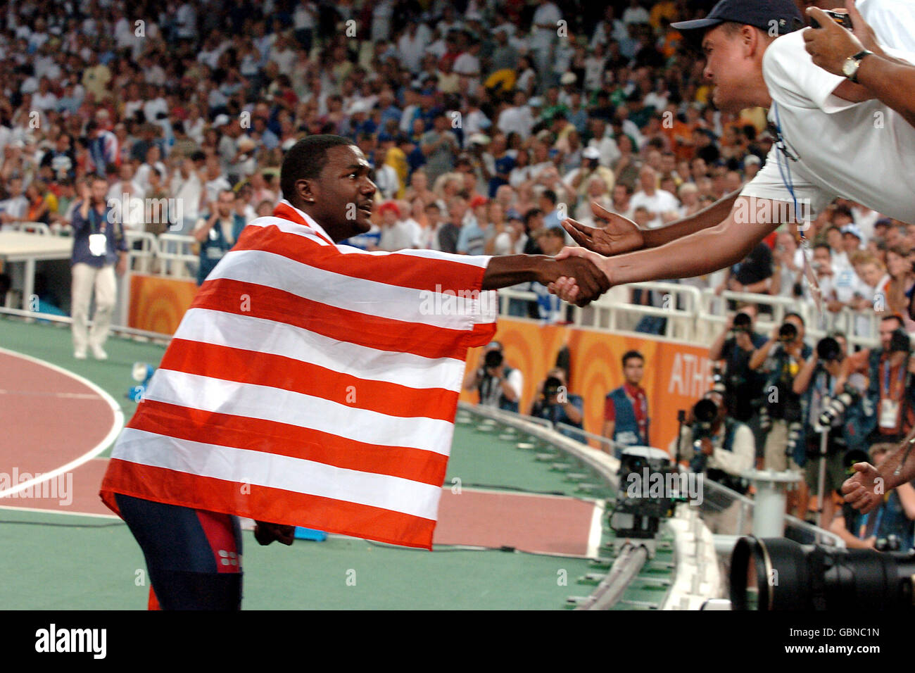 Athletics - Athens Olympic Games 2004 - Men's 100m - Final Stock Photo ...