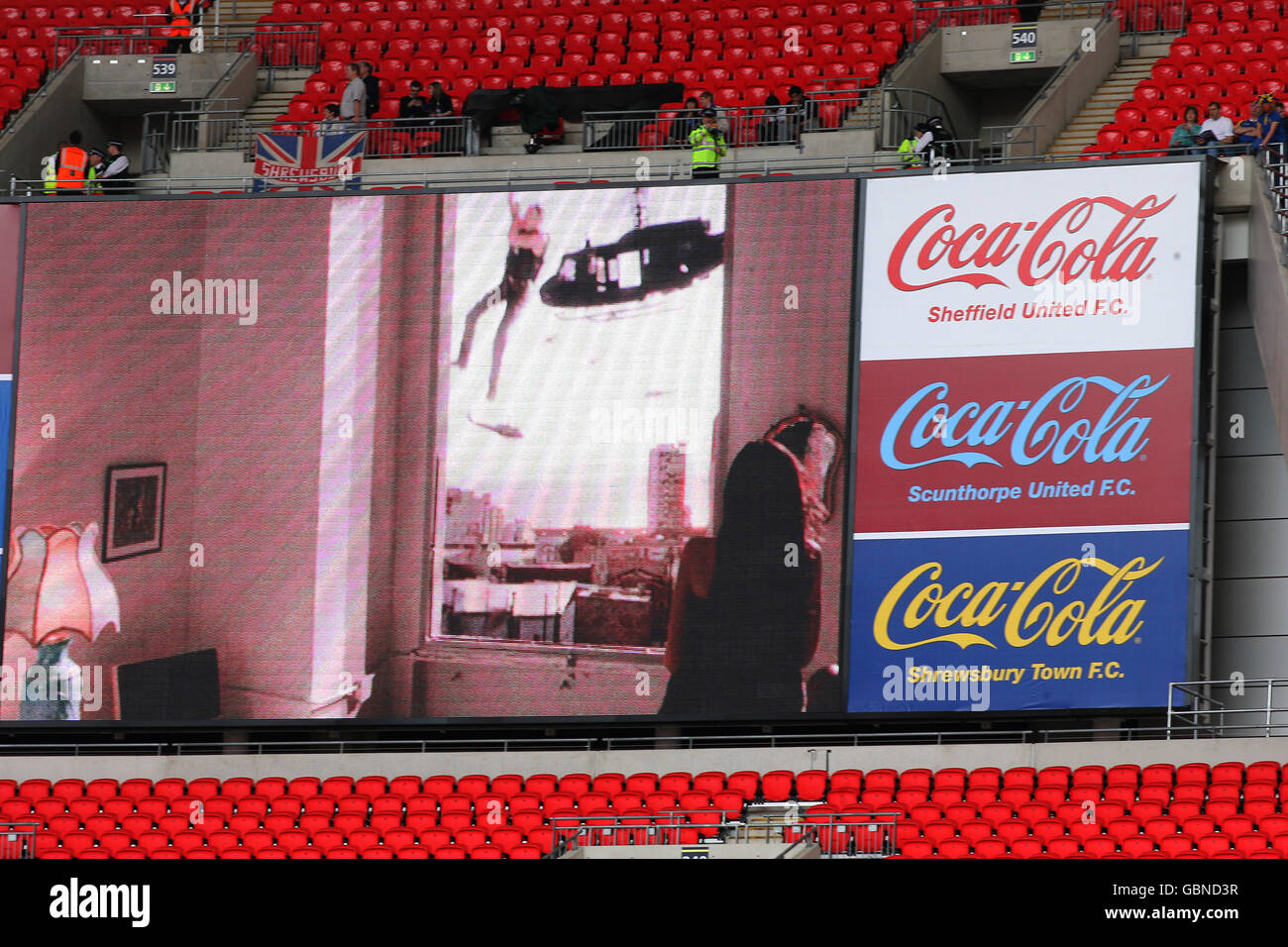 Coca-Cola advertisements on the big screen at Wembley Stadium Stock ...