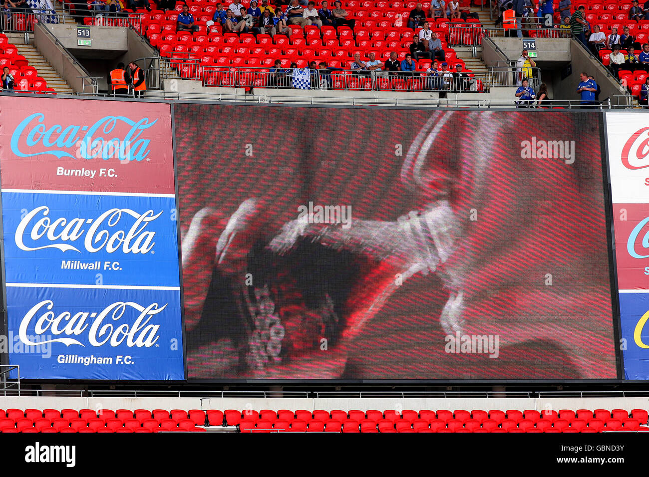Coca-Cola advertisements on the big screen at Wembley Stadium Stock ...