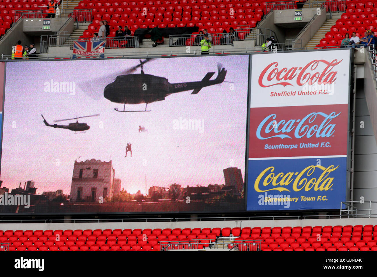 Coca-Cola advertisements on the big screen at Wembley Stadium Stock ...