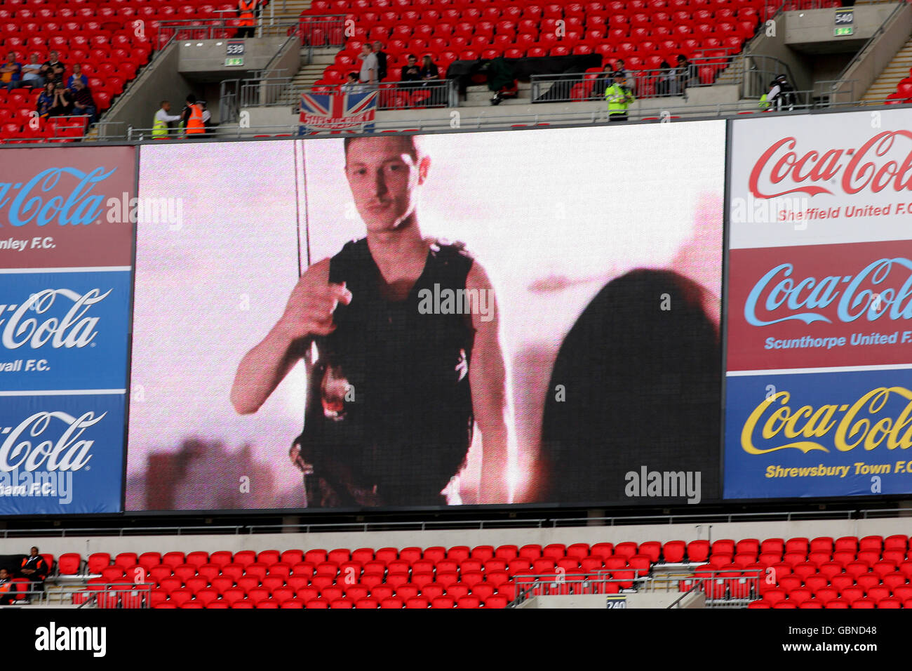 Coca-Cola advertisements on the big screen at Wembley Stadium Stock ...