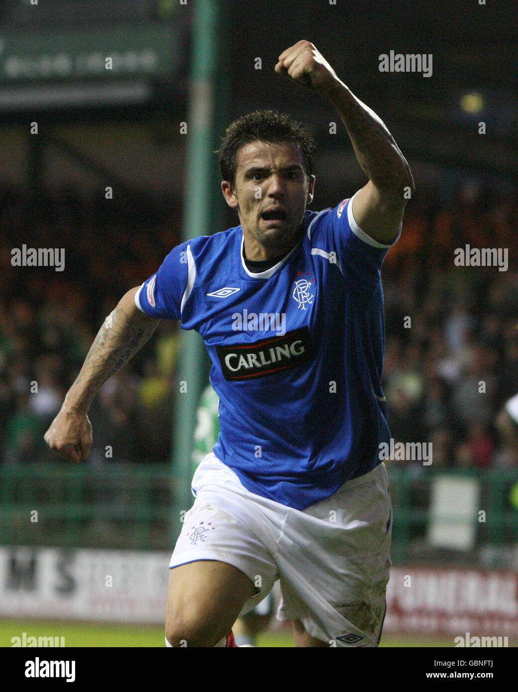 Rangers' Nacho Novo celebrates scoring their first goal of the game ...