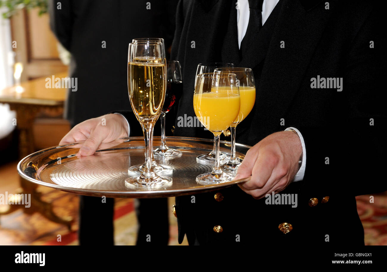 A member staff carries hi-res stock photography and images - Alamy