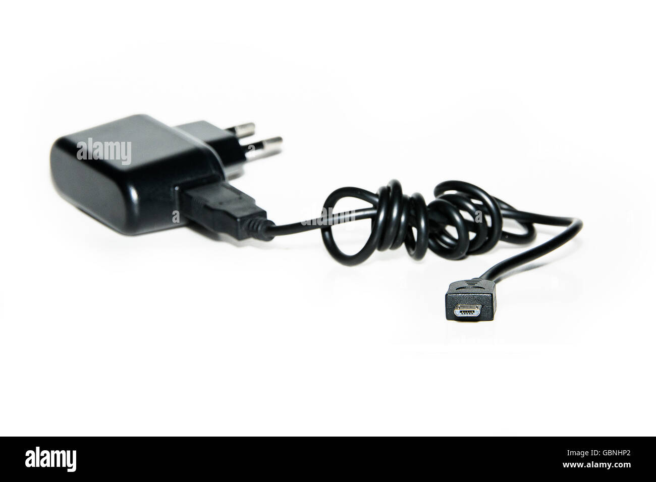 Smart phone charger isolated on a white background Stock Photo - Alamy