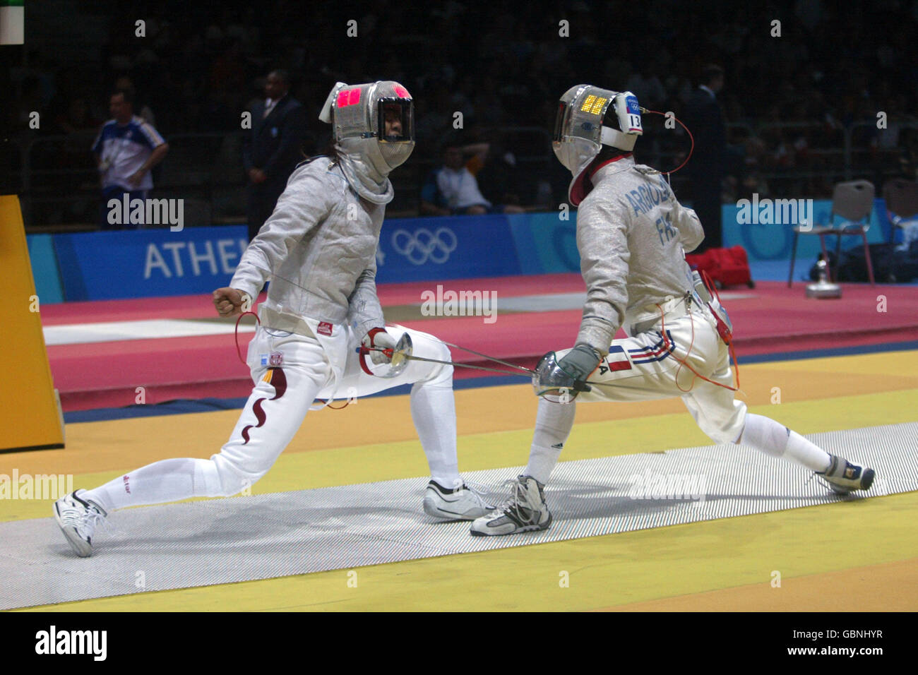 China's Xue Tan (l) on her way to beating France's Cecile Argiolas (r ...