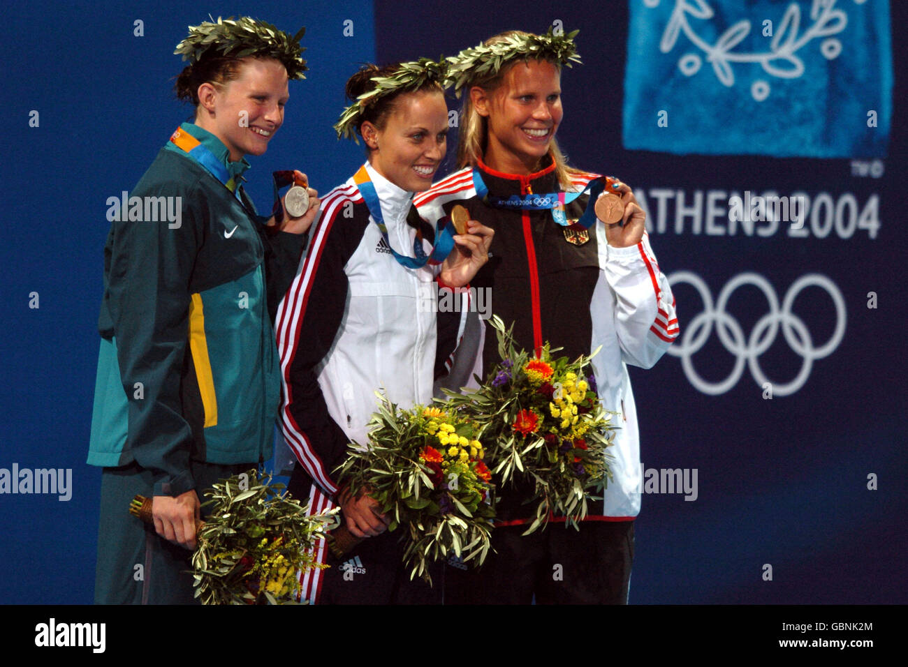 (l-r) Australia's Leisel Jones (silver), USA's Amanda Beard (gold) and ...