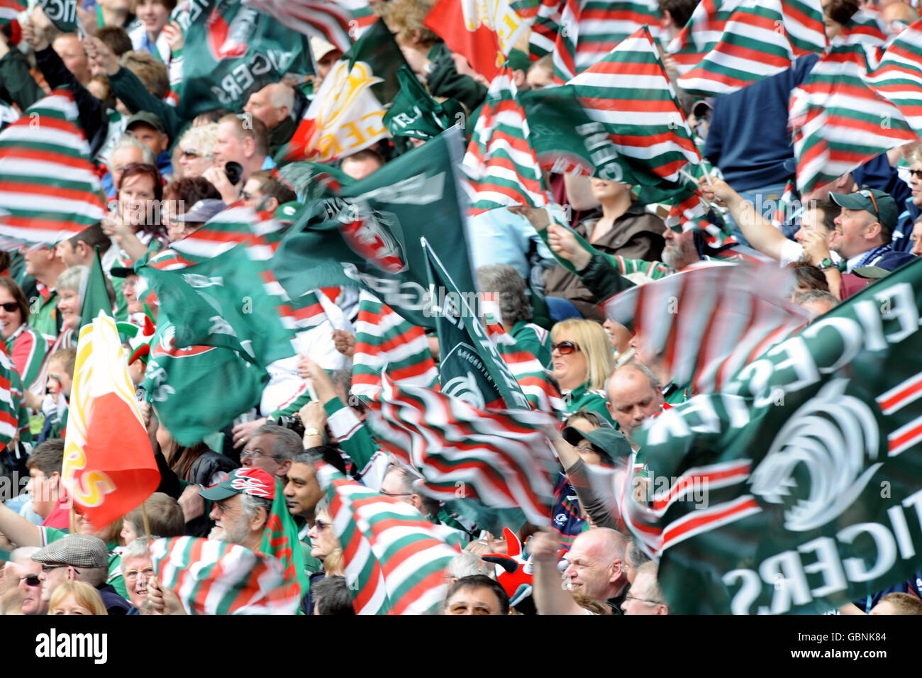 London irish fans wave flags in the stands hi-res stock photography and ...