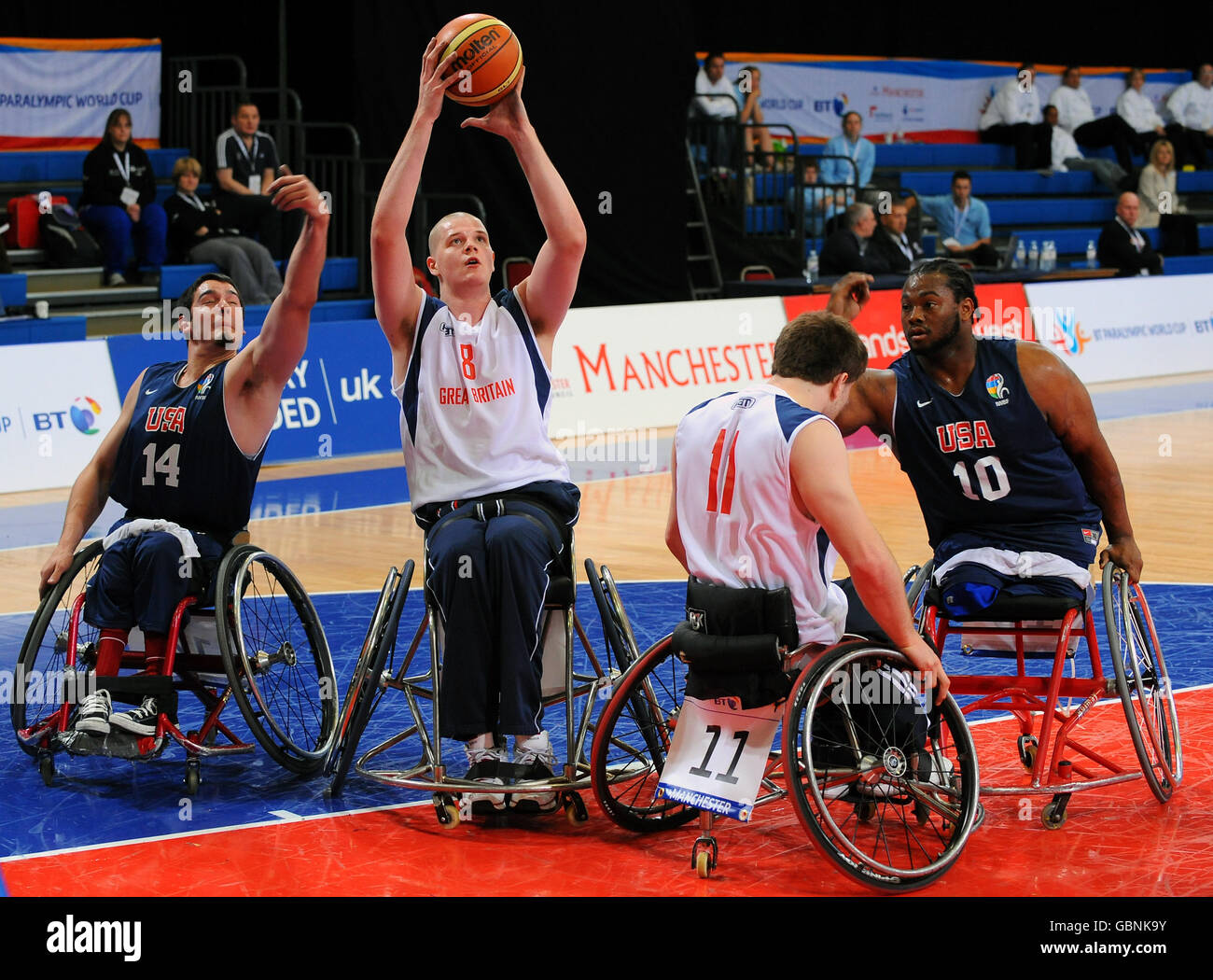 Great Britain's Lee Manning takes a shot under pressure from USA's ...