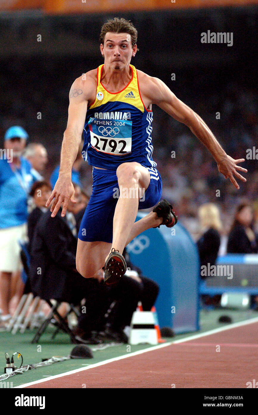 Athletics athens olympic games 2004 mens triple jump final hi-res stock ...
