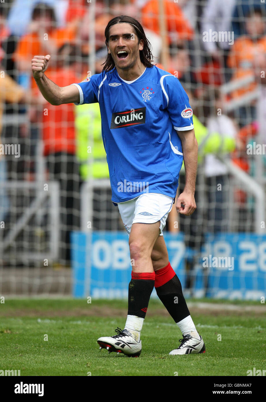 Rangers' Pedro Mendes celebrates scoring their second goal during the ...