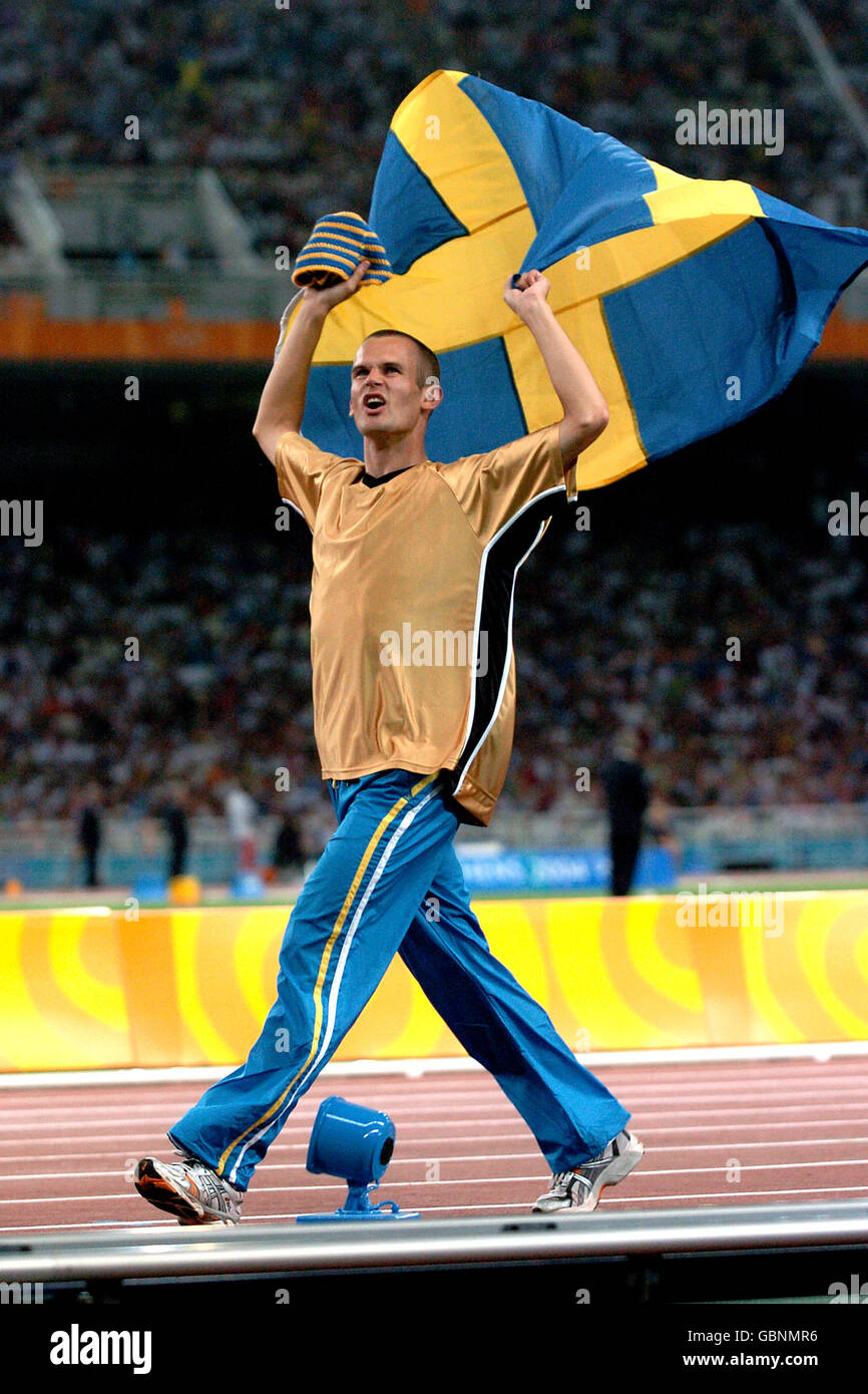 Athletics athens olympic games 2004 mens high jump final hi-res stock ...