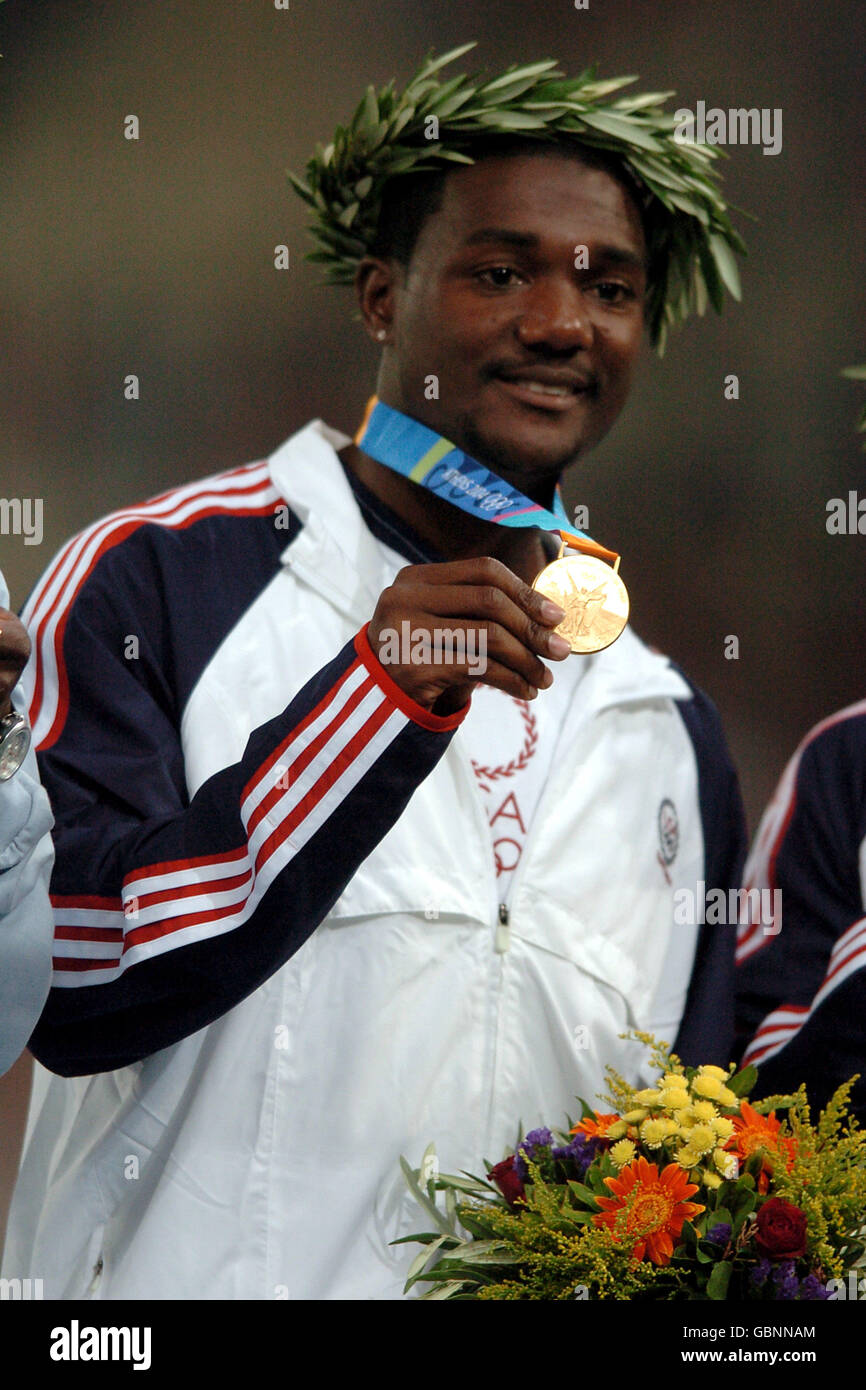 Athletics athens olympic games 2004 mens 100m final hi-res stock ...