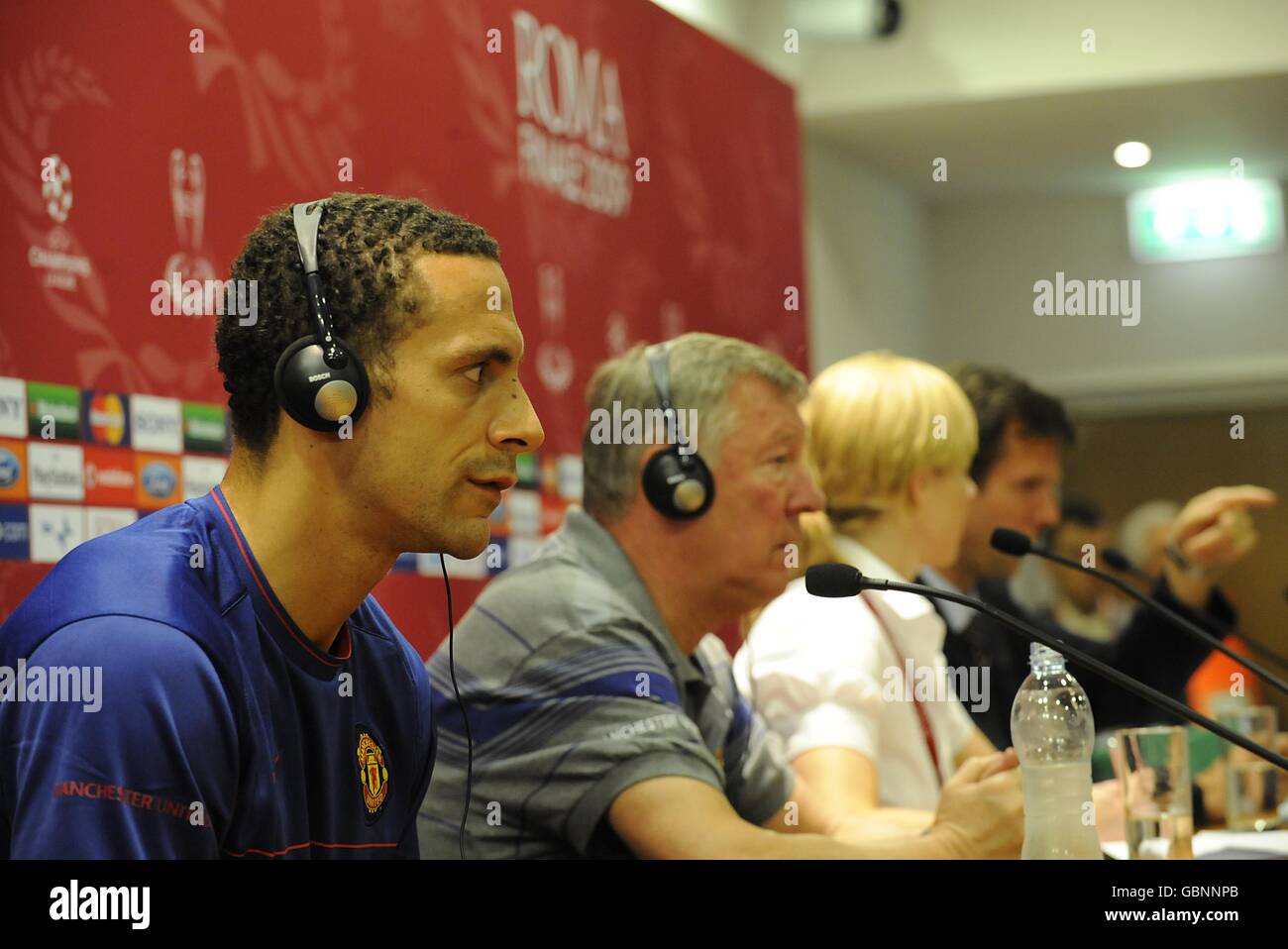 Manchester United's Rio Ferdinand (left) and manager Alex Ferguson ...