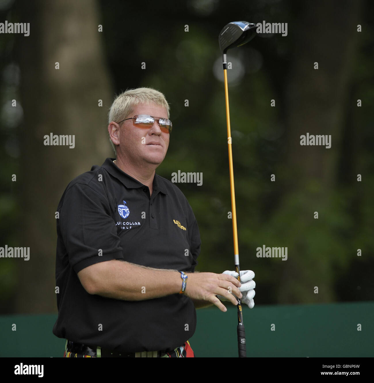 USA's John Daly watches his drive from the 18th tee during Round 1 of ...