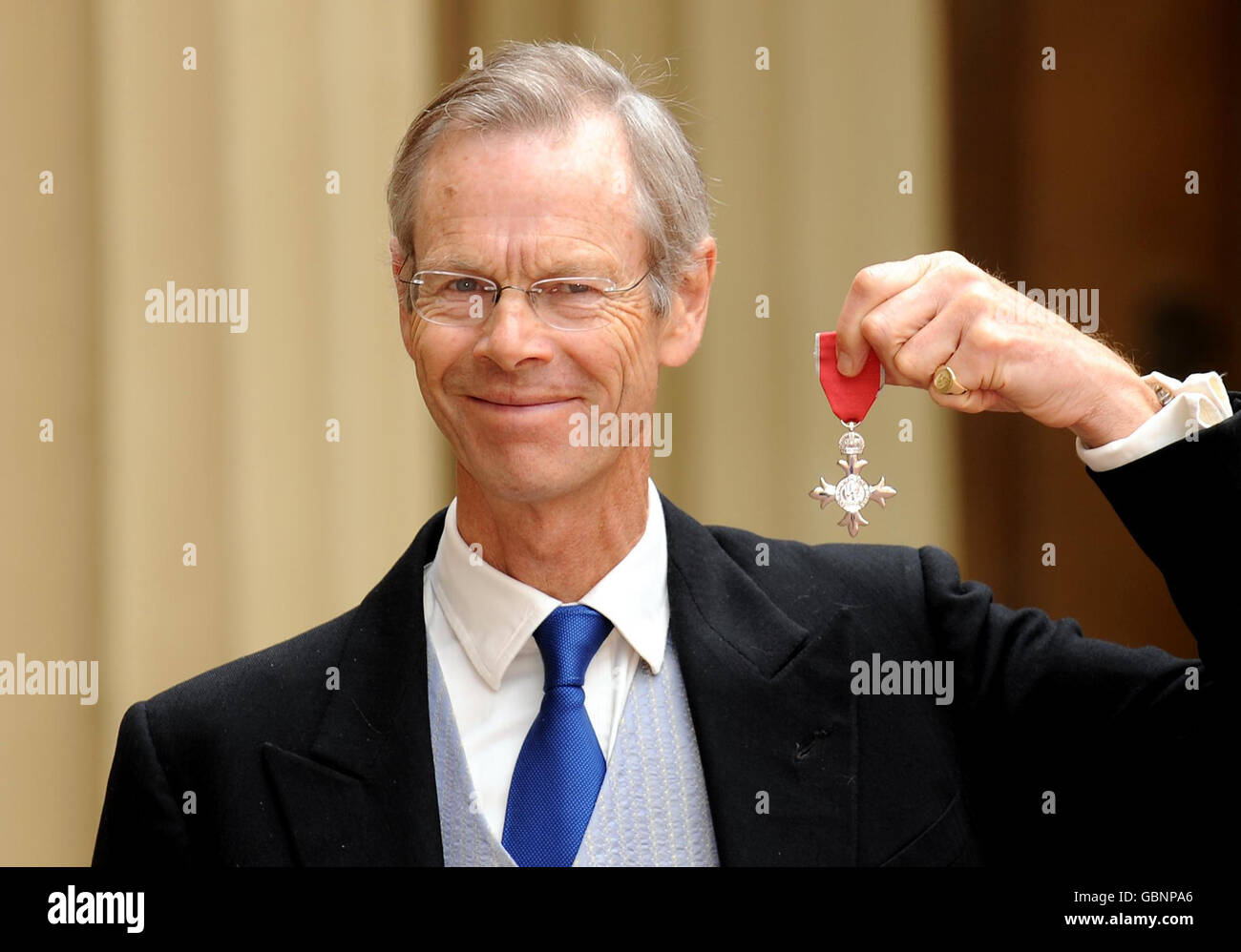 Cricket commentator and writer Christopher Martin Jenkins poses outside ...