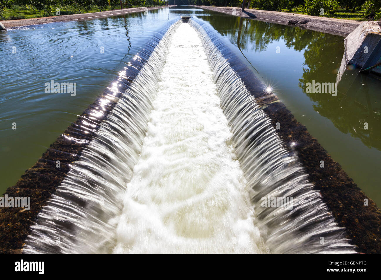 An irrigation canal in the San Joaquin Valley of California near ...