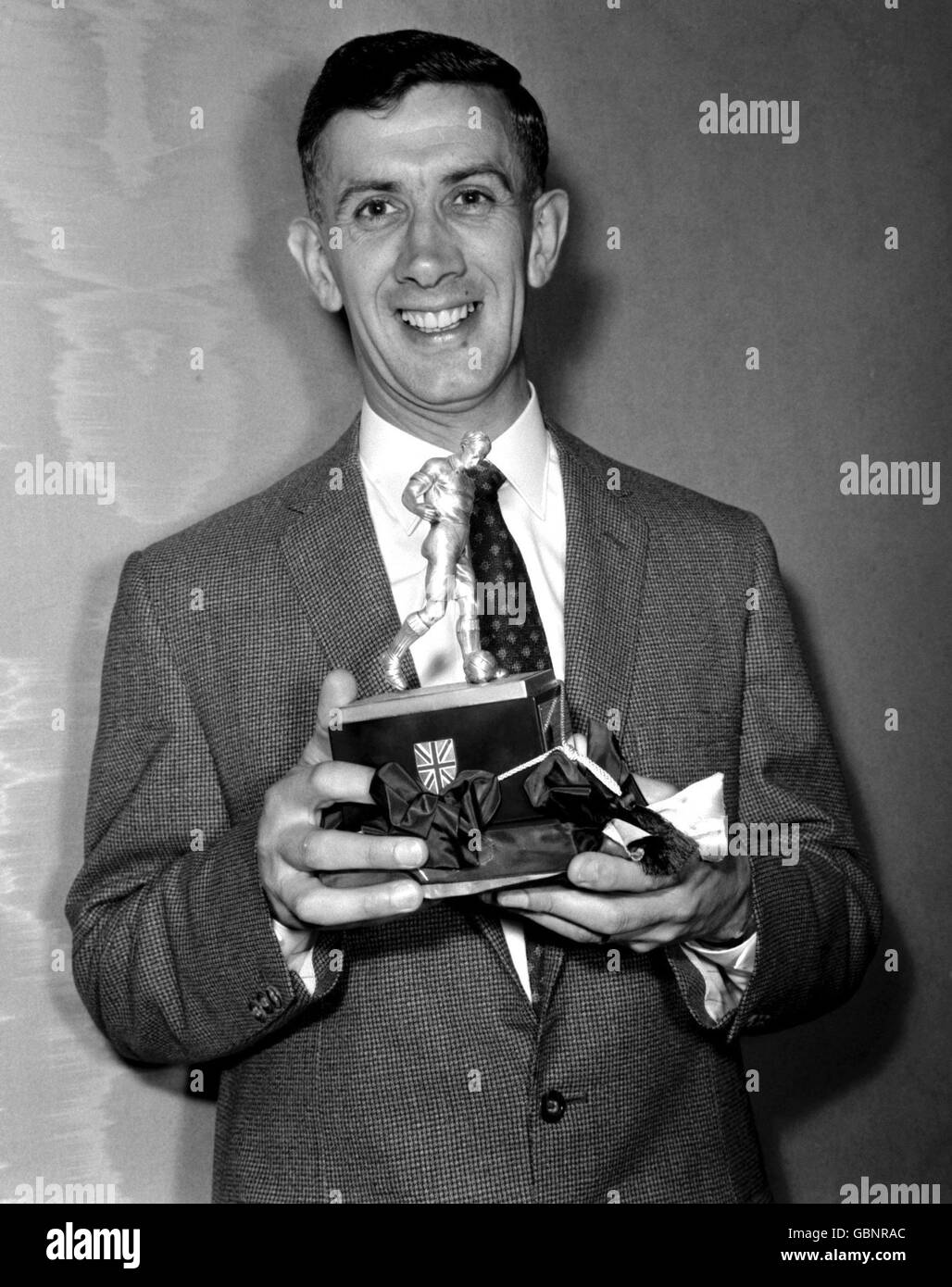 Winner of the footballer of the year trophy hi-res stock photography ...