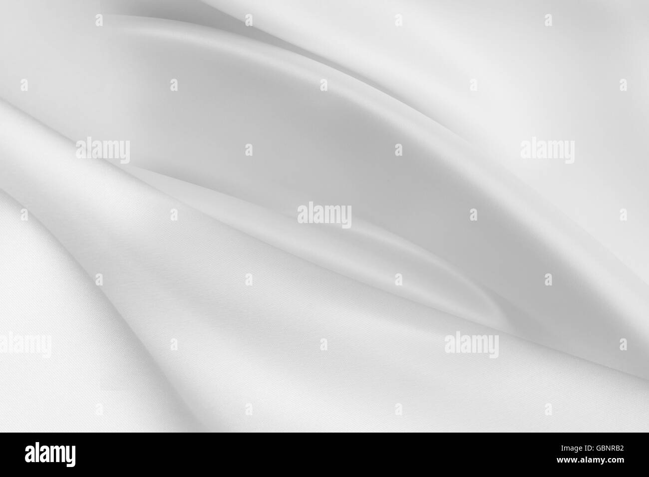 Closeup of rippled white silk fabric Stock Photo - Alamy