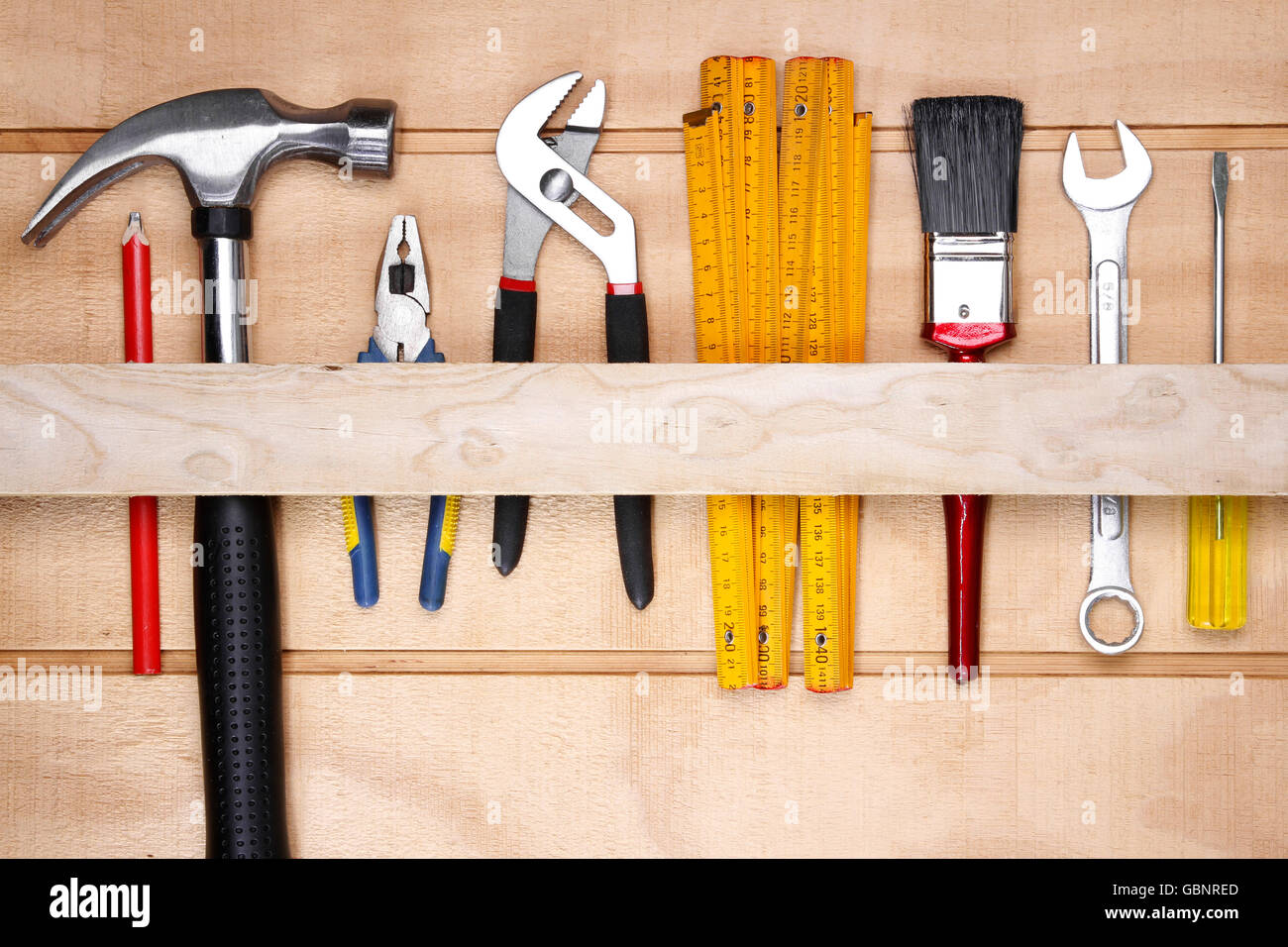 Assorted work tools on wood Stock Photo - Alamy