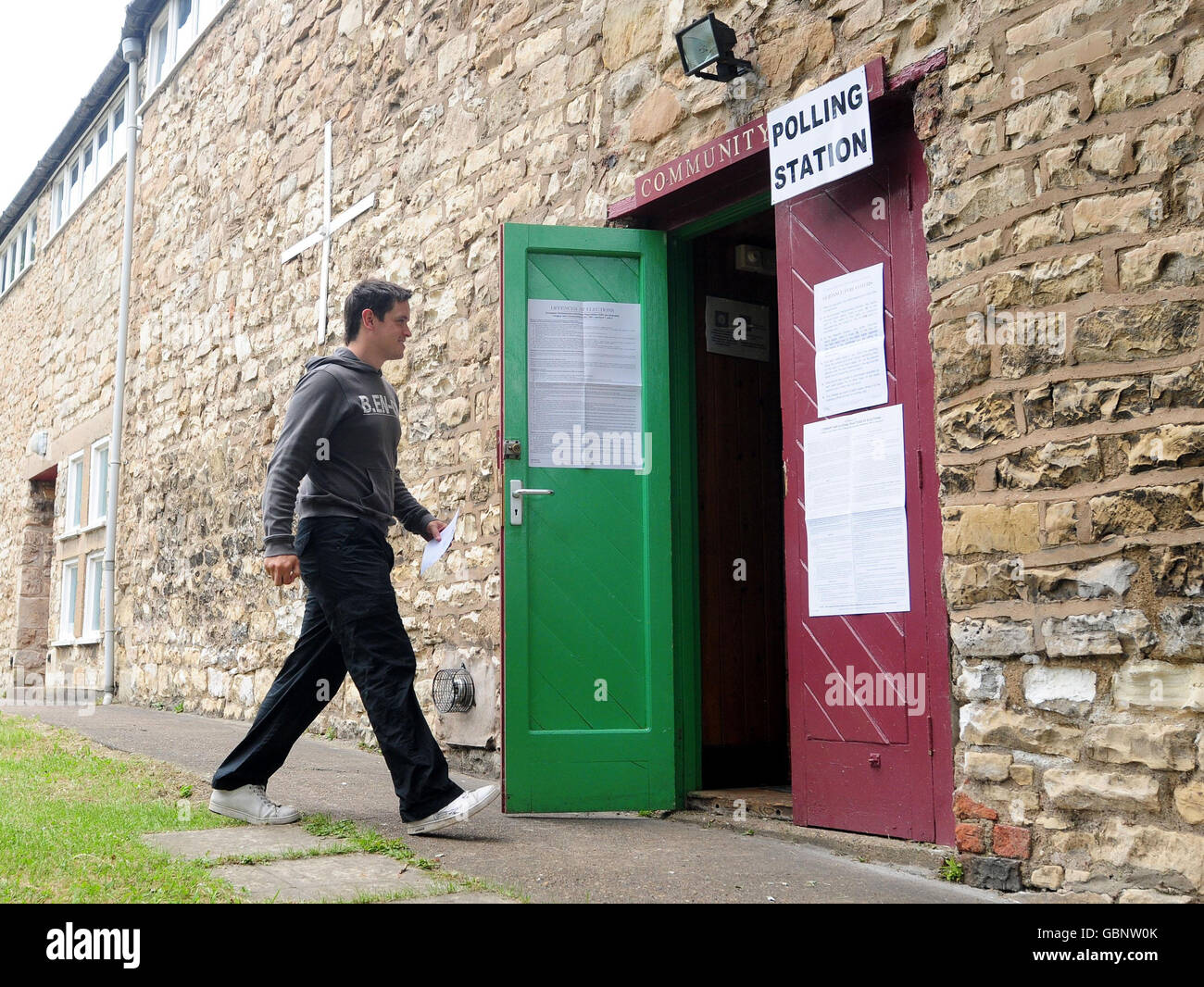 A man arrives to cast his vote in the European Parliamentary and ...