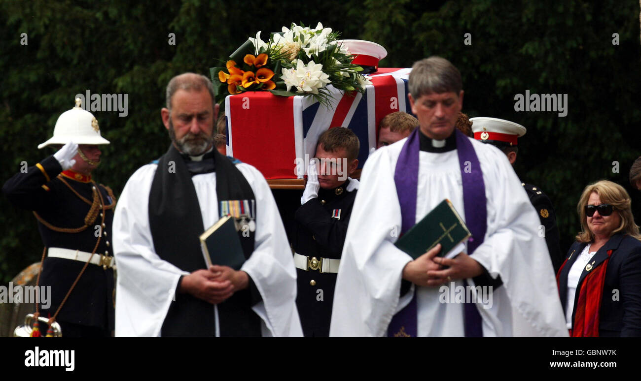 Marine Jason Mackie's coffin is carried from St Mary's Church in ...
