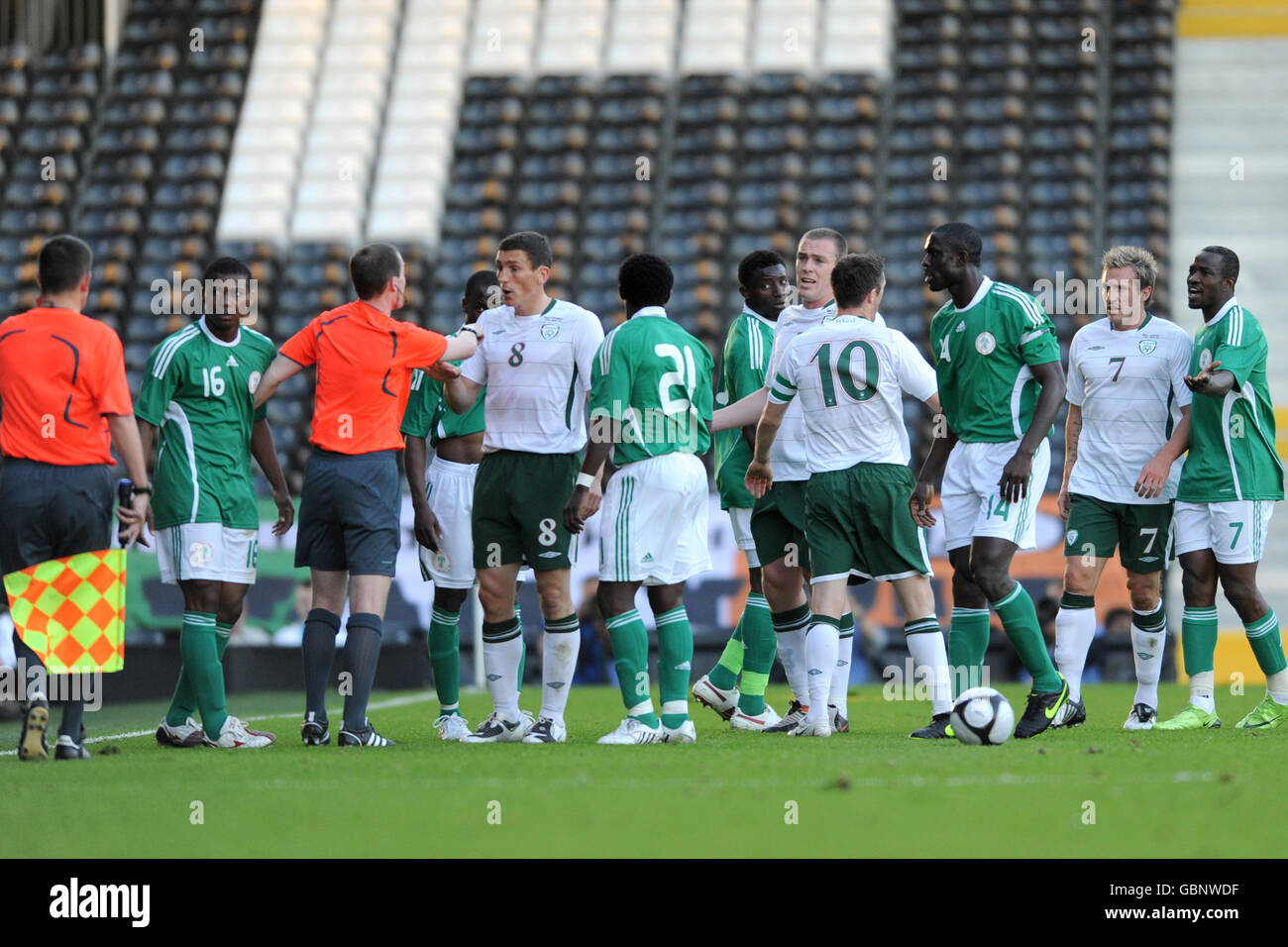 Tempers flare between Nigeria and Ireland players during the game Stock ... Tempers flare between Nigeria and Ireland players during the game Stock ...