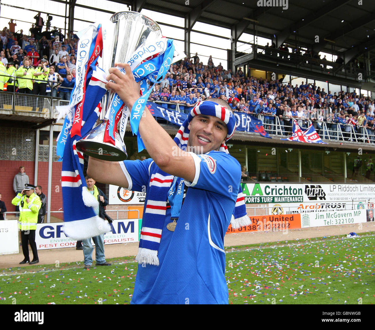 Rangers' Madjid Bougherra celebrates with the SPL trophy Stock Photo ...