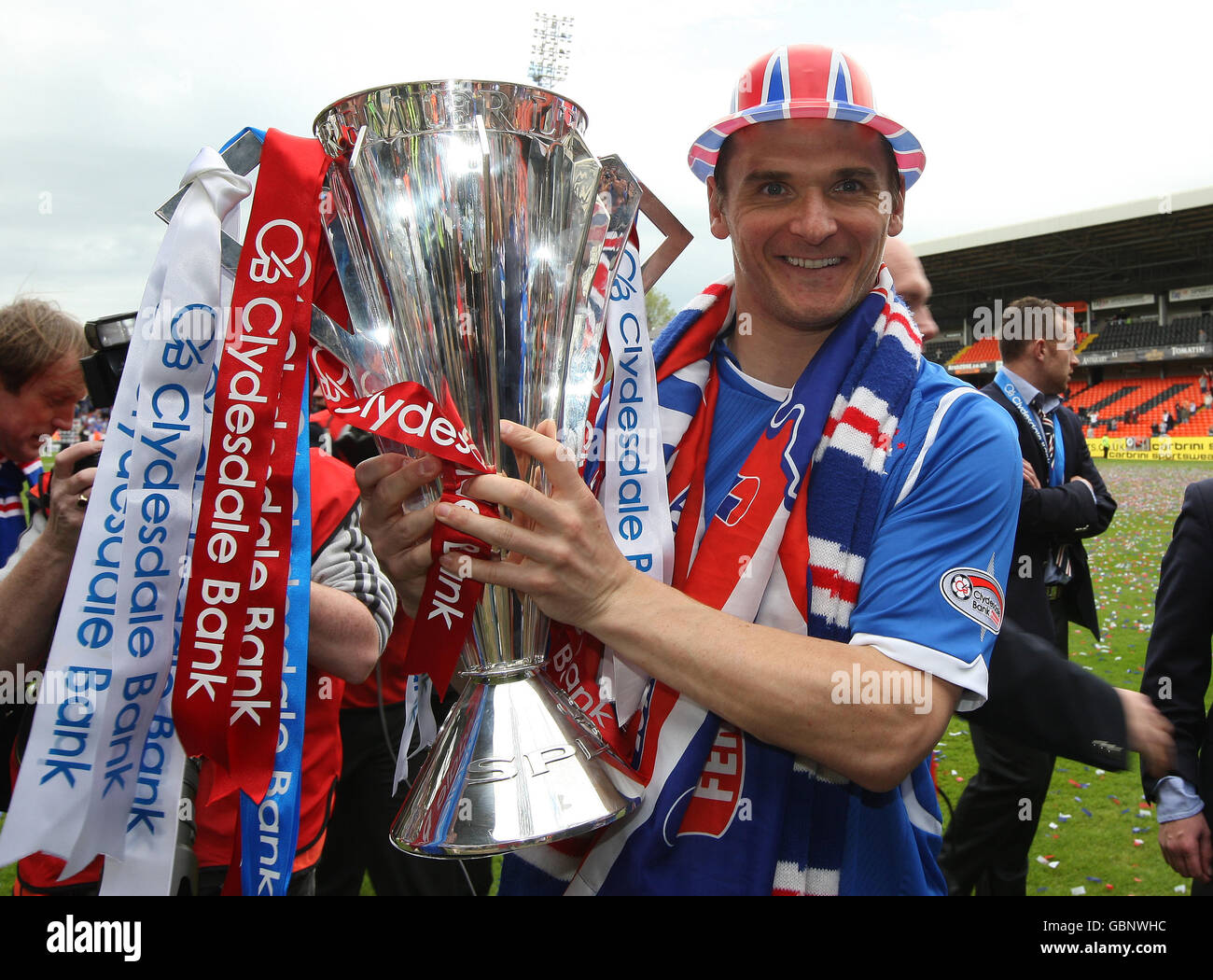 Rangers lee mcculloch celebrates with the spl trophy hi-res stock ...