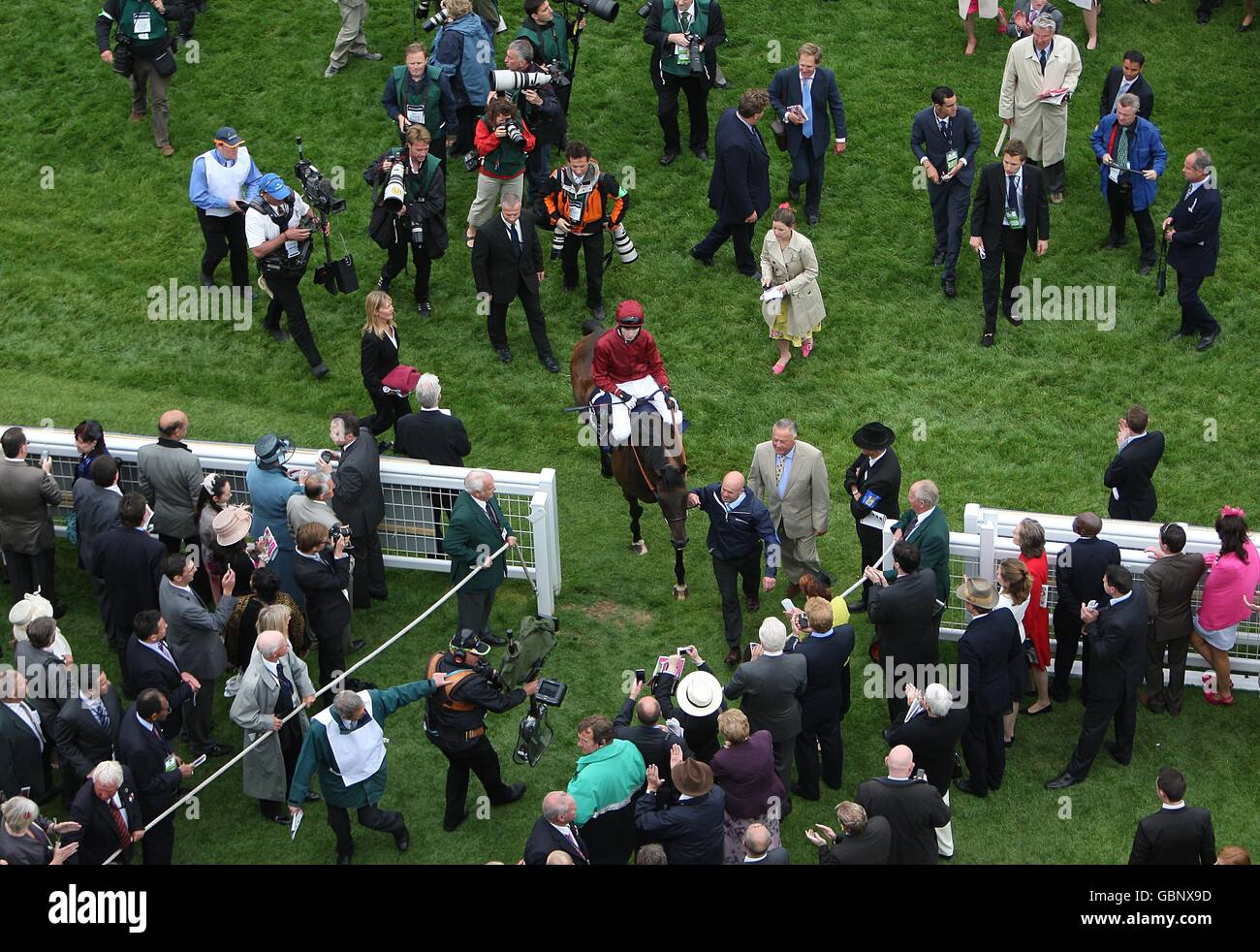 Jockey Jamie Spencer on Sariska (centre) is photographed as he enters ...