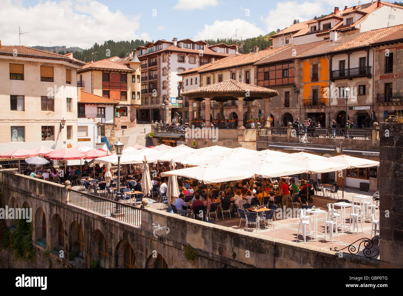 View of the main square in the Spanish town of Potes in the Pico de ...